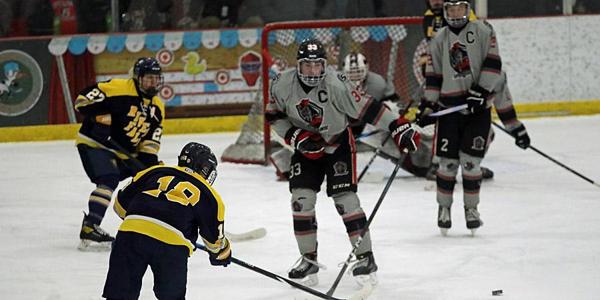 Somerset Weathers the Storm and Downs River Falls for Sectional Title