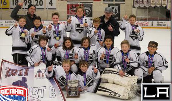 Squirt B2 team celebrates SCAHA title, off to states