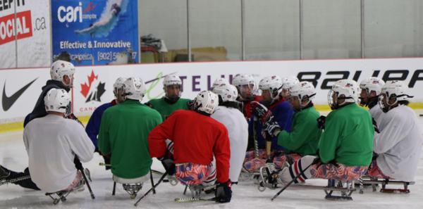 U.S. Paralympic Sled Players Hone Skills Across Ice, Grass and Snow